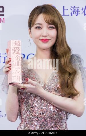 Chinese singer and actress Jin Sha poses on the red carpet as she ...