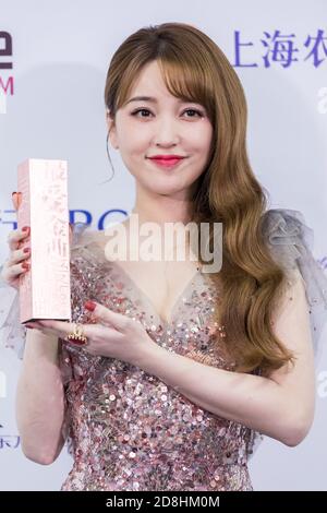 Chinese singer and actress Jin Sha poses on the red carpet as she ...