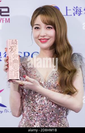 Chinese actress and singer Jin Sha attends an activity in Shanghai ...