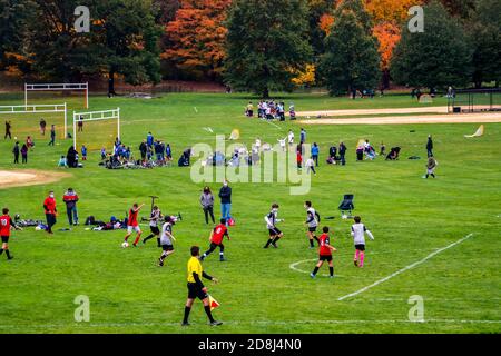 People participate in football activities at a China Sports Lottery ...