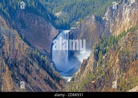 The famous and scenic Yellowstone Falls at Yellowstone National Park is ...