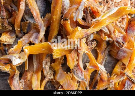 raw fishes being air dried on a balcony vertical compositon Stock Photo ...