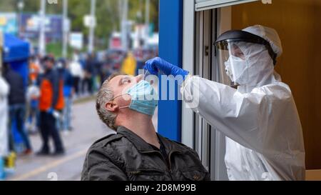 BRATISLAVA, SLOVAKIA - OCTOBER 31 2020: Medical worker taking samples ...
