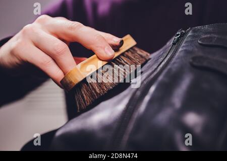 a man is painting shoes, blue shoe polish,Painted blaue leather shoes ...