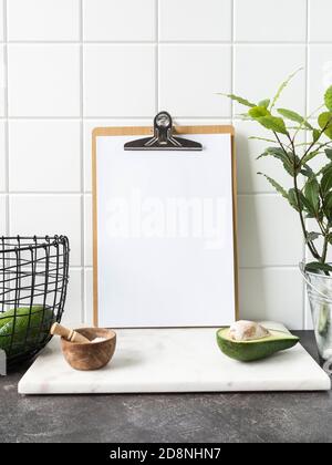 front view of the kitchen marble countertop with cans of coffee and a ...