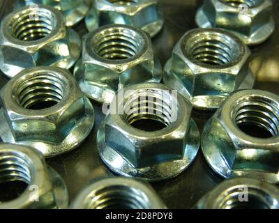 High angle shot of metal nuts bunch Stock Photo - Alamy