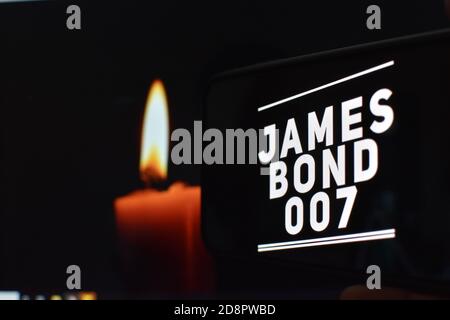 007 text on mobile phone with candle background, james bond Stock Photo ...