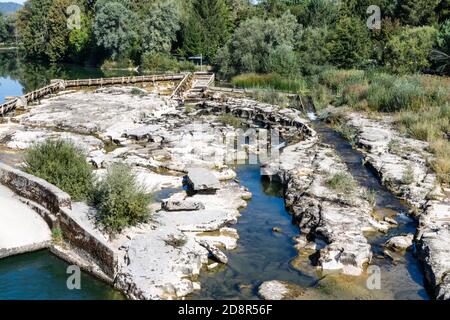 Impressive rock formation in the Ain river at Pont de Poitte village ...