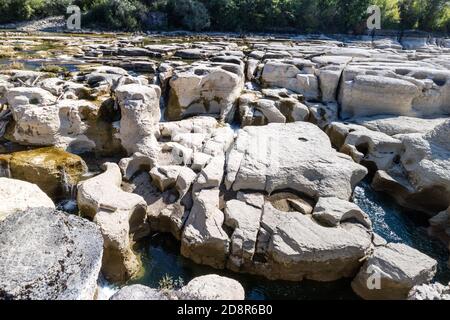 Impressive rock formation in the Ain river at Pont de Poitte village ...