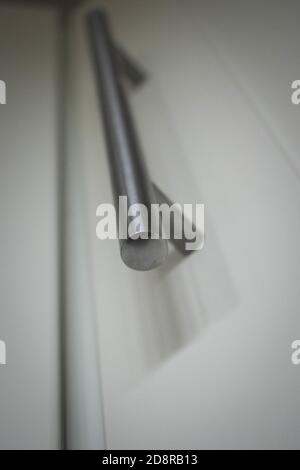 Close-up of a white metal cabinet labelled Earthquake Emergency ...