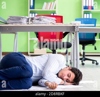Frustrated businessman stressed from excessive work Stock Photo - Alamy