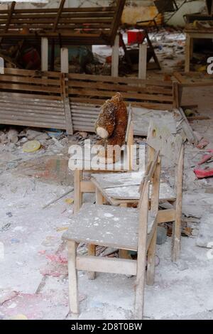 Headless teddy bear toy on minimal background symbolizing anxiety ...