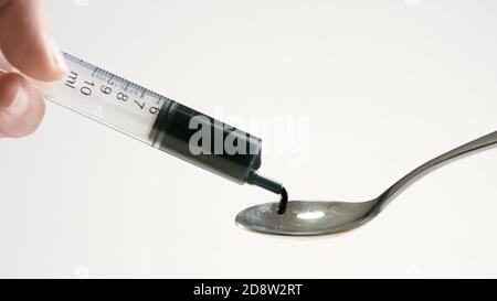 CBD Paste made of Hemp cannabidiol in syringe. Cannabis oil extract on ...