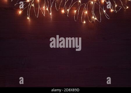 Christmas garland on brown background Stock Photo - Alamy