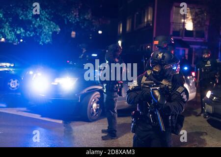 Seattle, USA. 31st Oct, 2020. Police pushing protestors at the ...