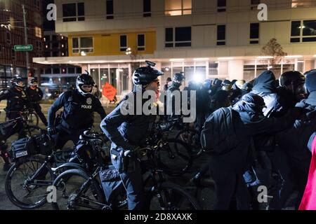 Seattle, USA. 31st Oct, 2020. Police pushing protestors at the ...