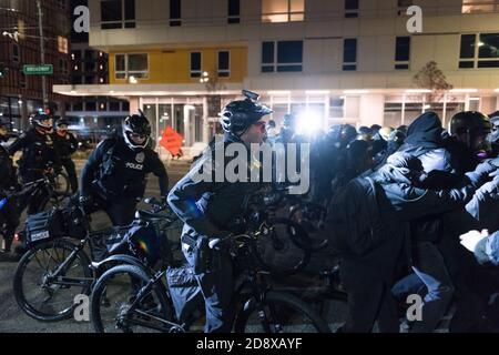 Seattle, USA. 31st Oct, 2020. Police pushing protestors at the ...