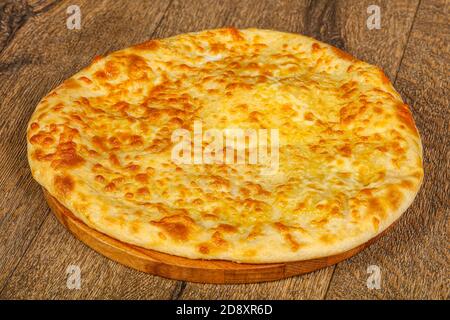Georgian cuisine - round khachapuri with meat and cheese Stock Photo ...