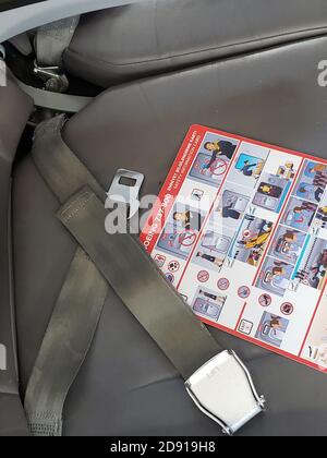 safety card and in flight magazine in seat pocket interior of jet2 ...