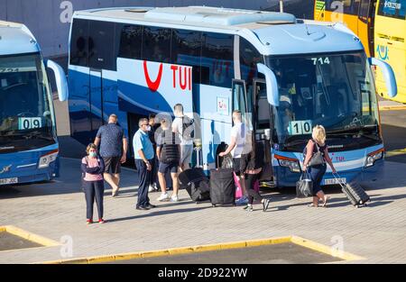 TUI clients, tourists boarding coaches at Gran Canaria airport. Canary ...