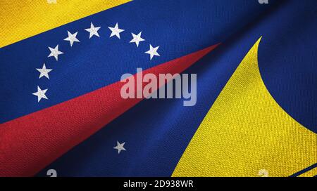 Tokelau and Venezuela two flags textile cloth, fabric texture Stock ...