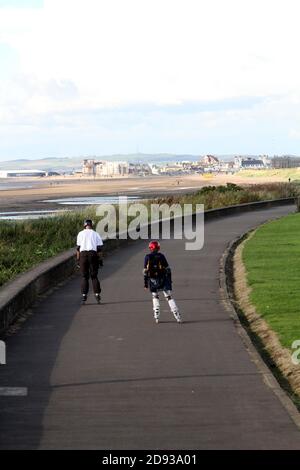 Doonfoot, Ayr, Ayrshire, Scotland, UK. Roller Bladers on promenade ...