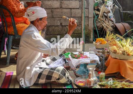 The Hindu Priest or widely known as Pedanda by the Balinese, blessing ...