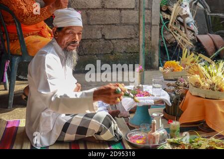 The Hindu Priest or widely known as Pedanda by the Balinese, blessing ...