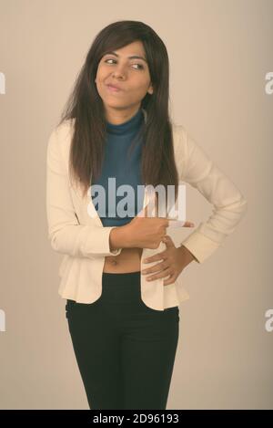 Side portrait of a disgusted young business man Stock Photo - Alamy