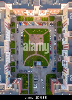 aerial top down view of a courtyard between two high rise buildings ...