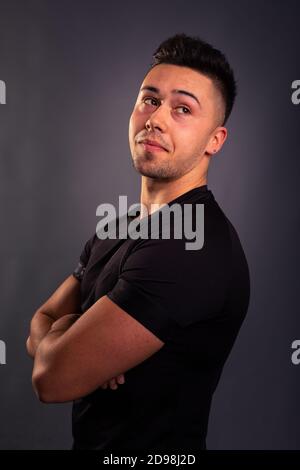 Studio fashion portrait of a handsome young Caucasian man Stock Photo ...