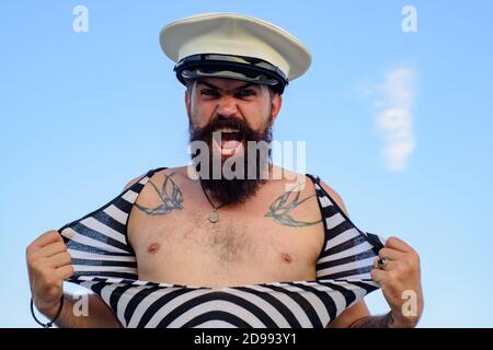 Funny excited captain. Expression face or sailor on sky background ...