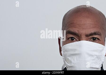 men with face masks fighting the coronavirus stock photo Stock Photo ...