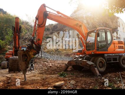 Breaker used to break up boulders in open cast mine. Mining in southern ...