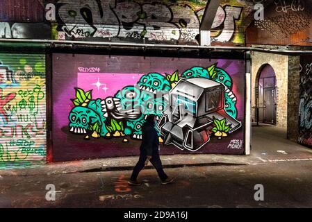 A man walks past Graffiti of a Halloween character Michael Myers at the ...