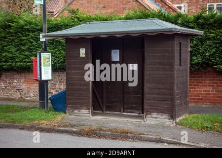 small enclosed village bus stop Stock Photo - Alamy