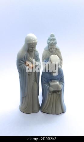 Porcelain nativity scene in pale blue and cream colours against a white ...