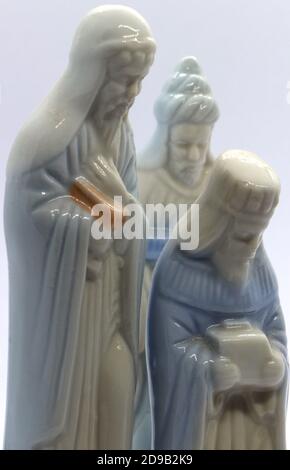 Porcelain nativity scene in pale blue and cream colours against a white ...