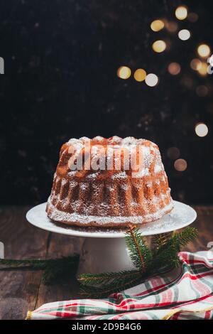 Christmas Cake. Bundt Cake on a wooden table Stock Photo - Alamy