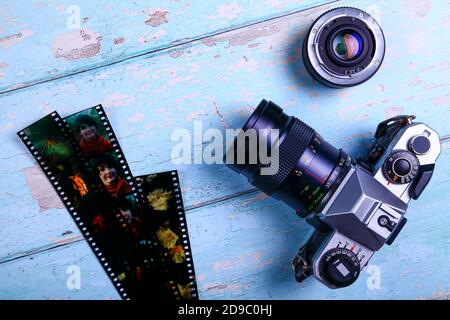 Vintage camera and film negatives on a slate background Stock Photo - Alamy