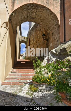 The old village of Maiera, Calabria, Italy with the Pollino massif in ...