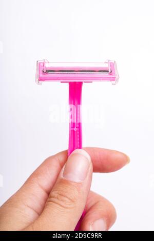 hand holding a disposable razor Stock Photo - Alamy