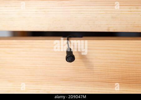 Secret audio listening. Installing secret microphone for surveillance ...