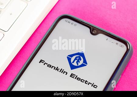In this photo illustration, the Franklin Electric (FE) logo is seen ...