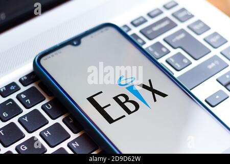In this photo illustration the Ebix logo seen displayed on a smartphone ...