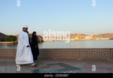 An Omani man walking on the Mutrah corniche in Oman Stock Photo - Alamy