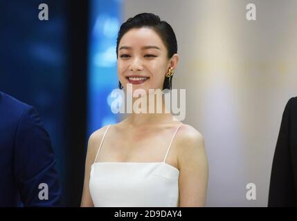 Chinese actress Ni Ni attends a commercial event in Shanghai, China, 12 ...