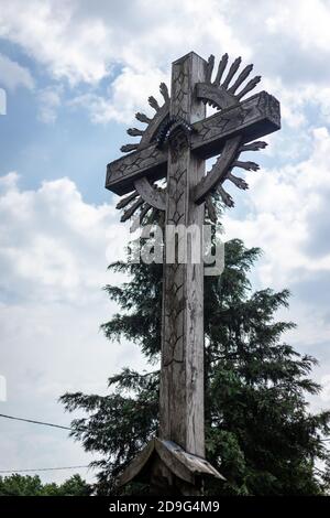 Ancient wooden cross with wood carvings Stock Photo - Alamy