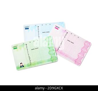 Different driving licenses on white background Stock Photo - Alamy