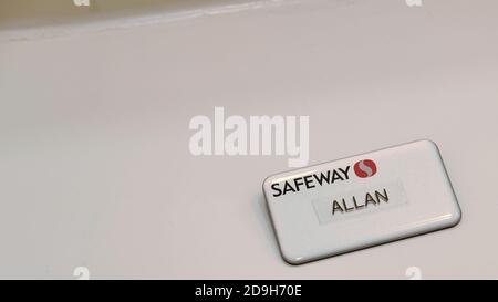 Safeway grocery store employee name tag with logo and worker's name ...